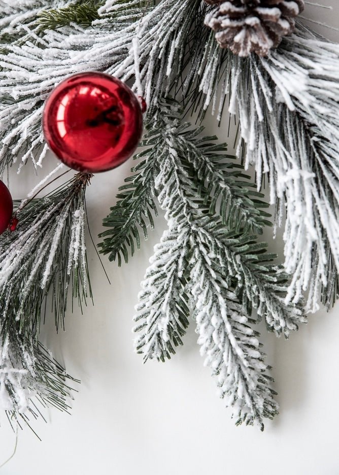 Flocked mixed pine with red ball spray - Greenery Market